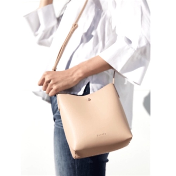 Anthropologie | Bags | Anthropologie Samara Nude Pink Faux Leather Refined Bucket Bag Crossbody ...